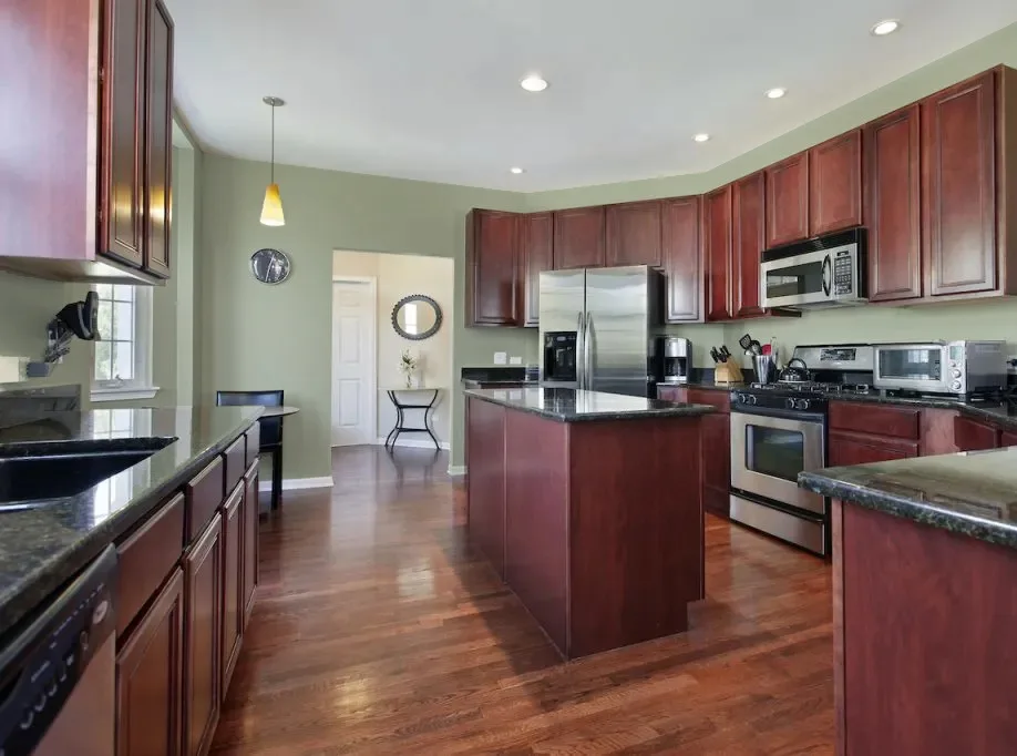 7 Wall Colors to Complement Cherry Kitchen Cabinets